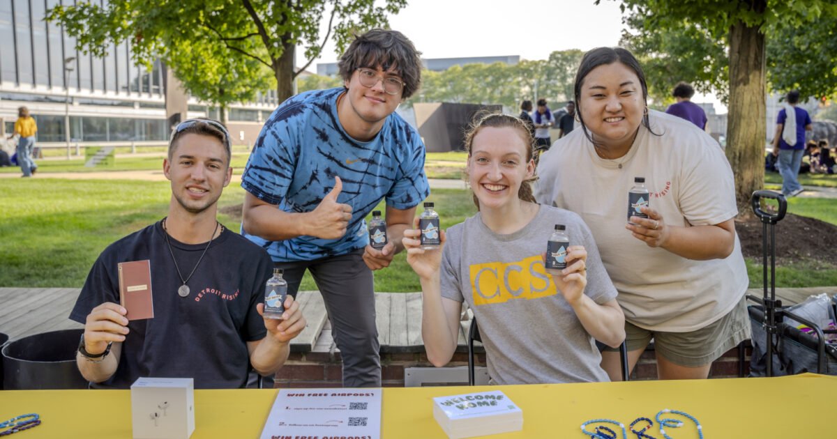 College ministry welcomes freshmen to campus by passing out holy water ...