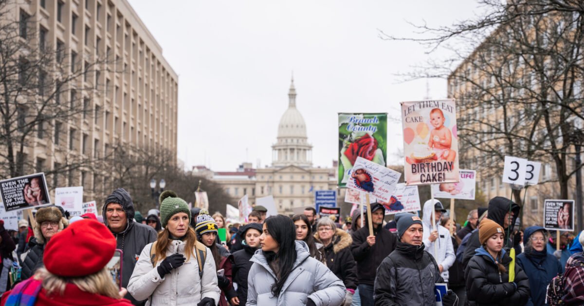 Still marching: Thousands from across state rally in first Michigan ...