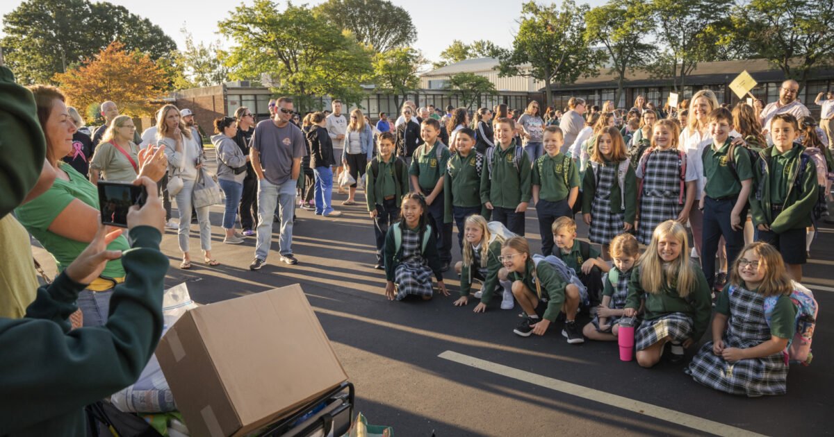 Starting off with a smile: New school year begins as students, teachers ...